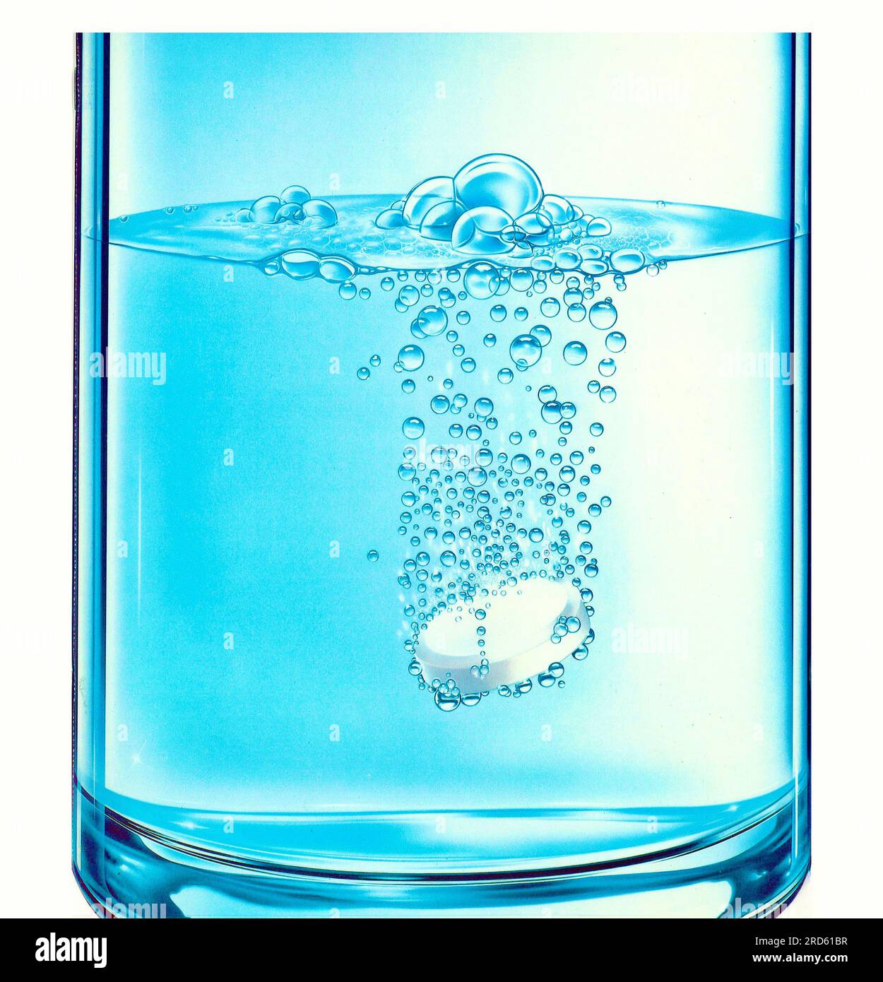 Dissolving pill, illustration Stock Photo - Alamy