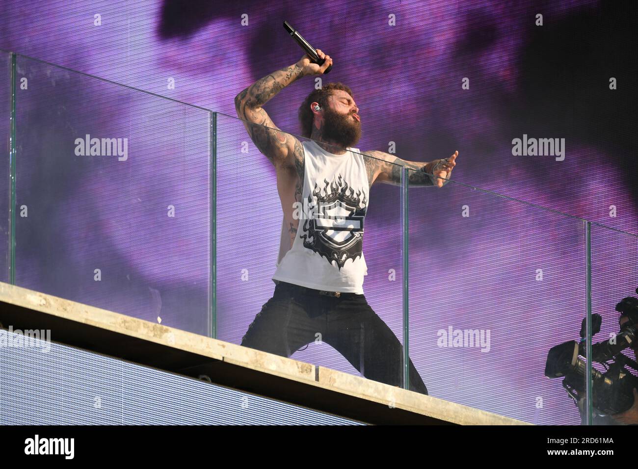 Post Malone performs a free concert on an outdoor stage at TSX Broadway ...