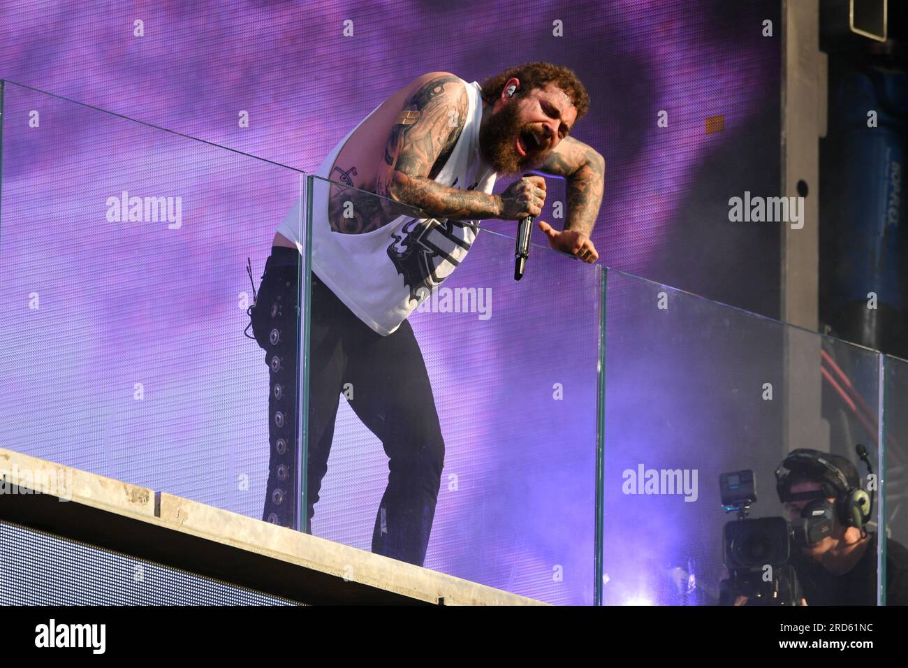 Post Malone performs a free concert on an outdoor stage at TSX Broadway ...