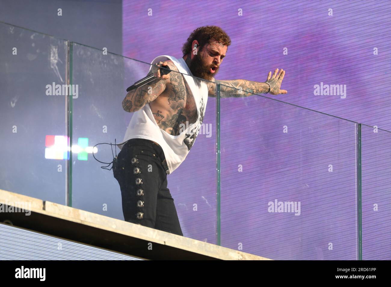 Post Malone performs a free concert on an outdoor stage at TSX Broadway ...