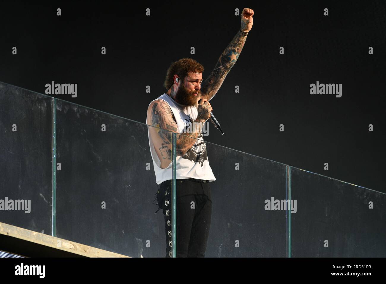 Post Malone performs a free concert on an outdoor stage at TSX Broadway ...