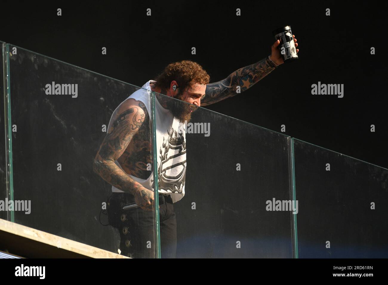 Post Malone performs a free concert on an outdoor stage at TSX Broadway ...