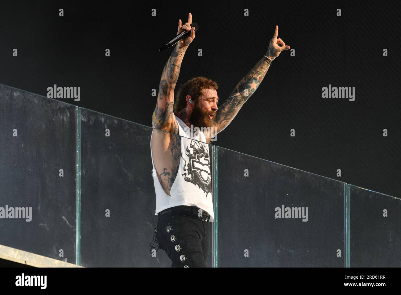 Post Malone performs a free concert on an outdoor stage at TSX Broadway ...