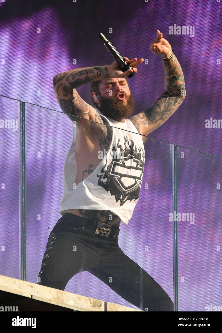 Post Malone performs a free concert on an outdoor stage at TSX Broadway ...