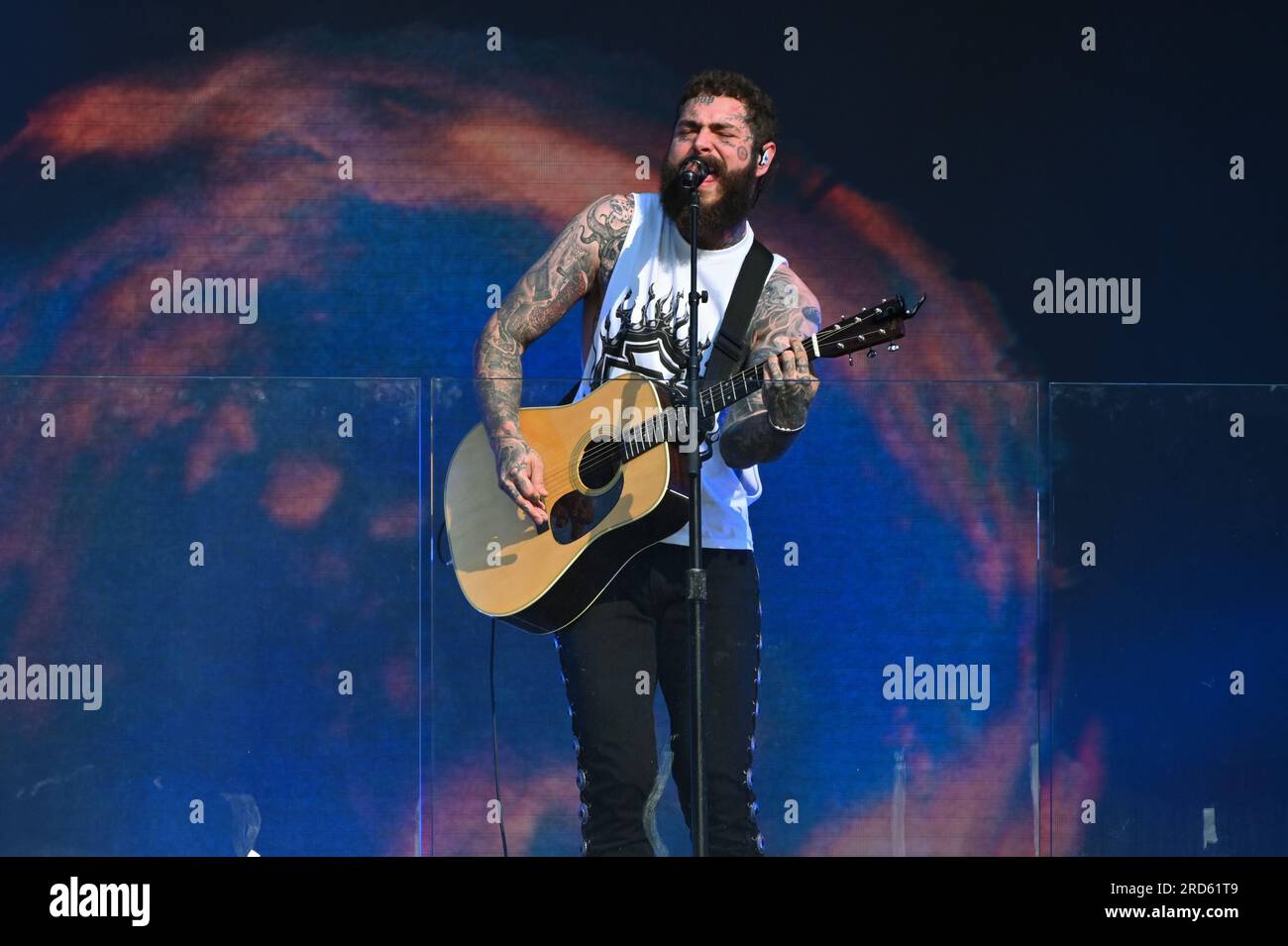 Post Malone performs a free concert on an outdoor stage at TSX Broadway ...