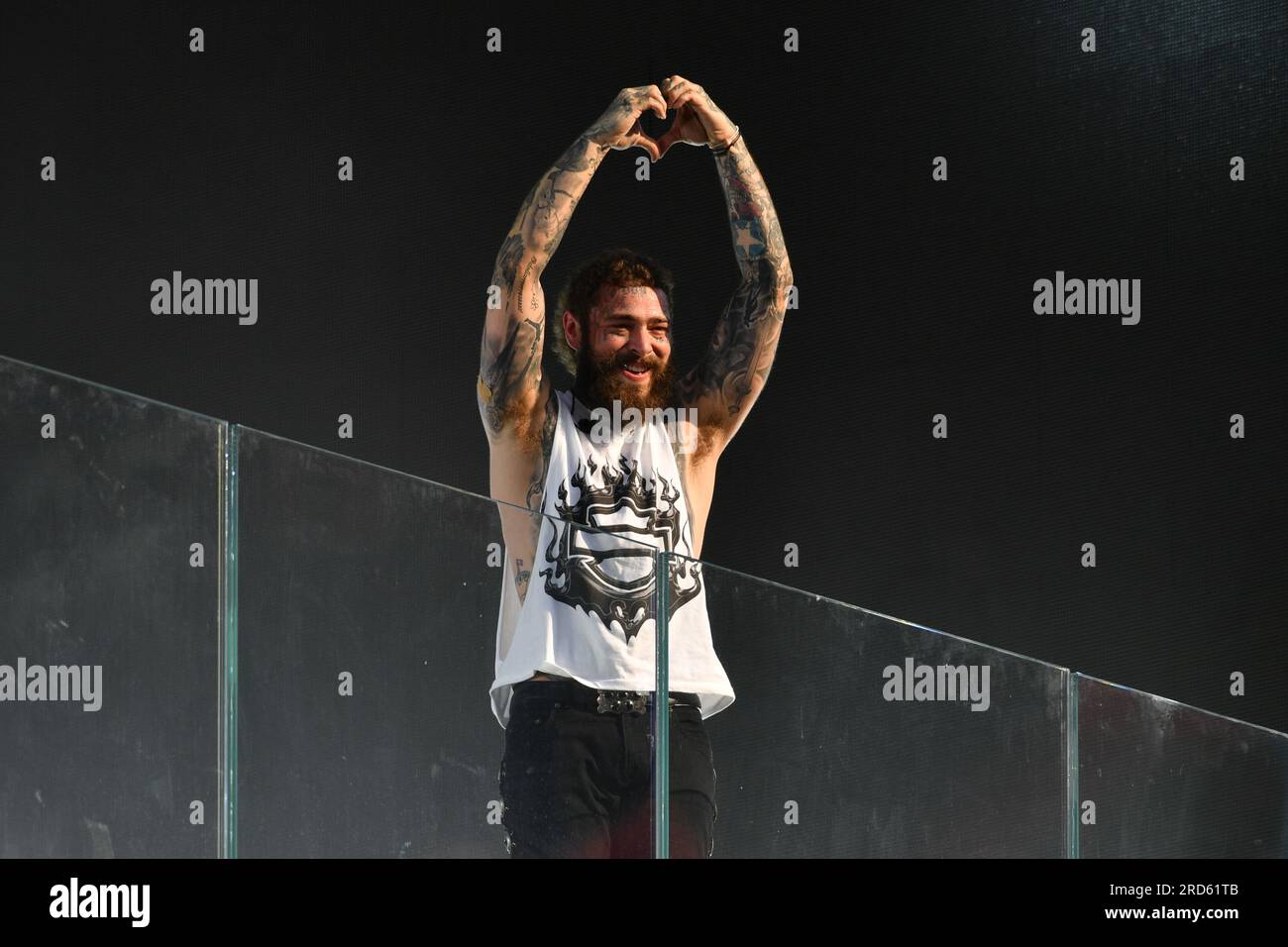 Post Malone performs a free concert on an outdoor stage at TSX Broadway ...