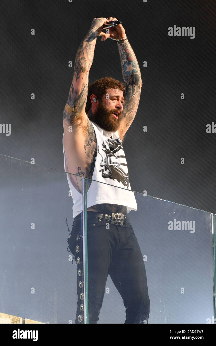Post Malone performs a free concert on an outdoor stage at TSX Broadway ...