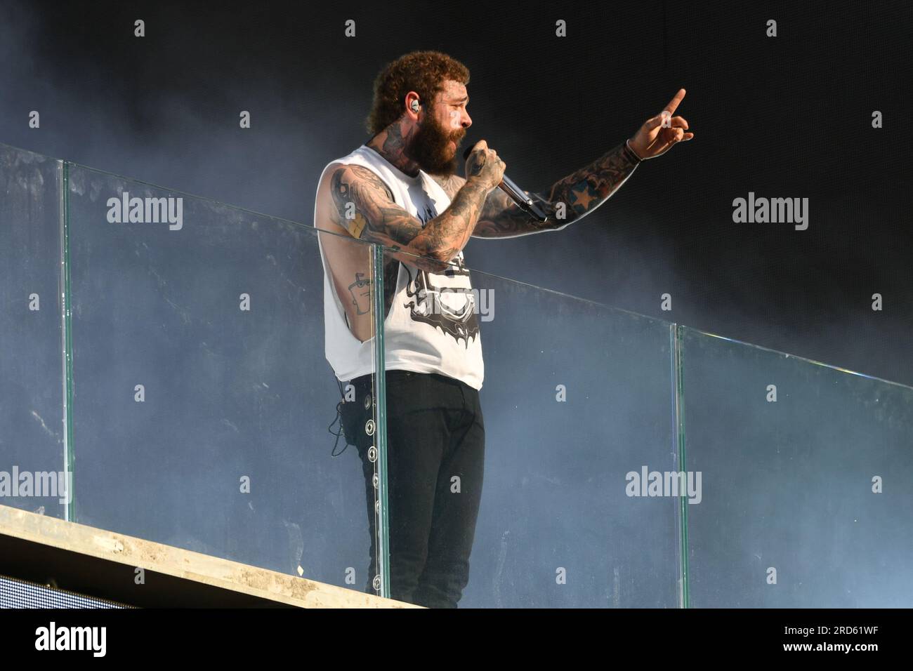 Post Malone performs a free concert on an outdoor stage at TSX Broadway ...