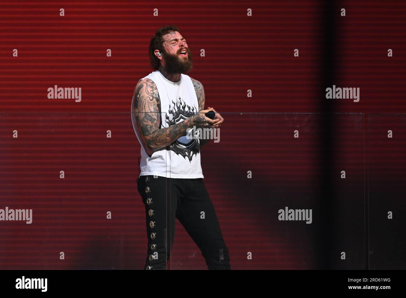 Post Malone performs a free concert on an outdoor stage at TSX Broadway ...