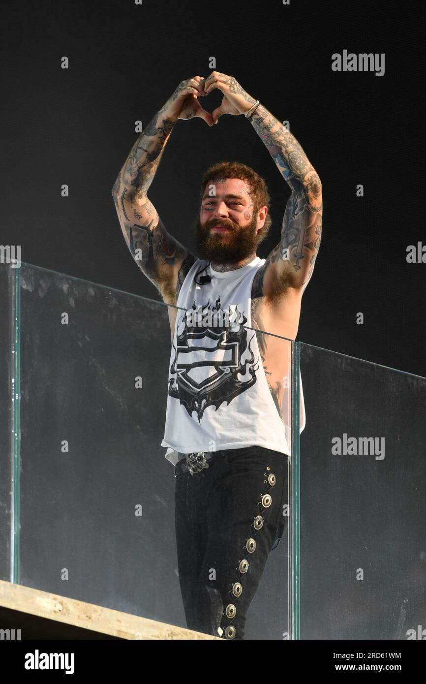 Post Malone performs a free concert on an outdoor stage at TSX Broadway ...