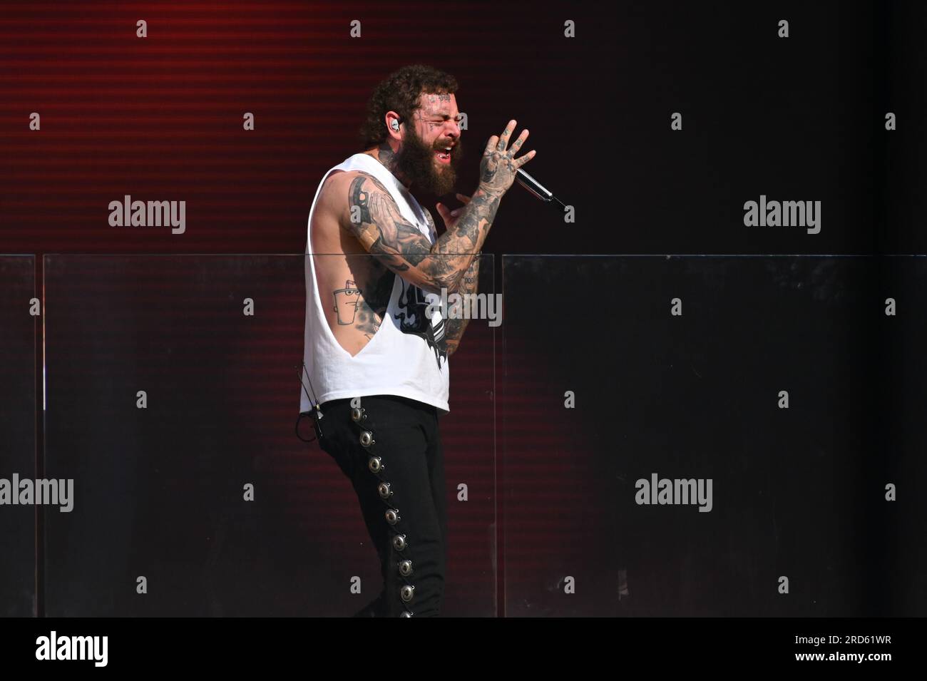 Post Malone performs a free concert on an outdoor stage at TSX Broadway ...