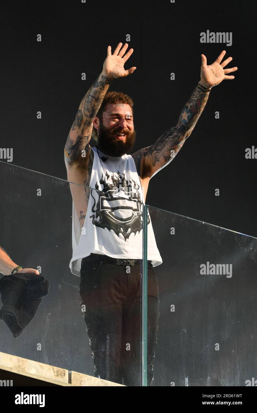 Post Malone performs a free concert on an outdoor stage at TSX Broadway ...