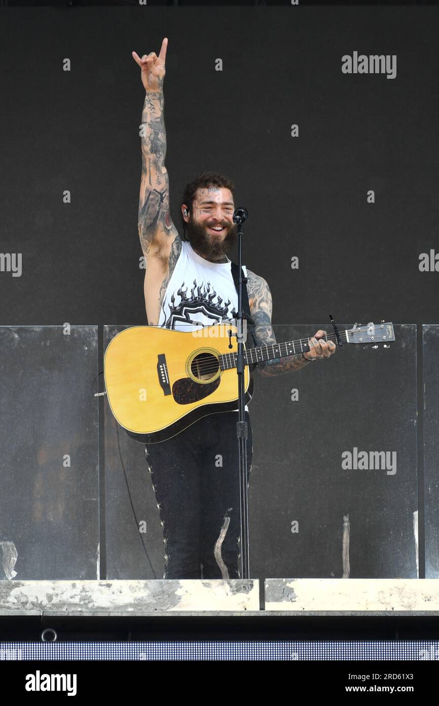 Post Malone performs a free concert on an outdoor stage at TSX Broadway ...