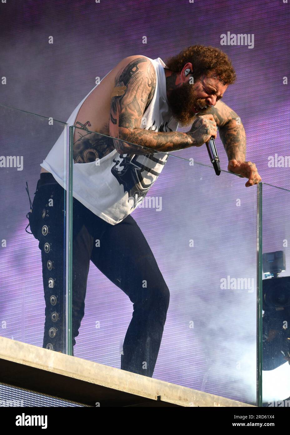 Post Malone performs a free concert on an outdoor stage at TSX Broadway ...
