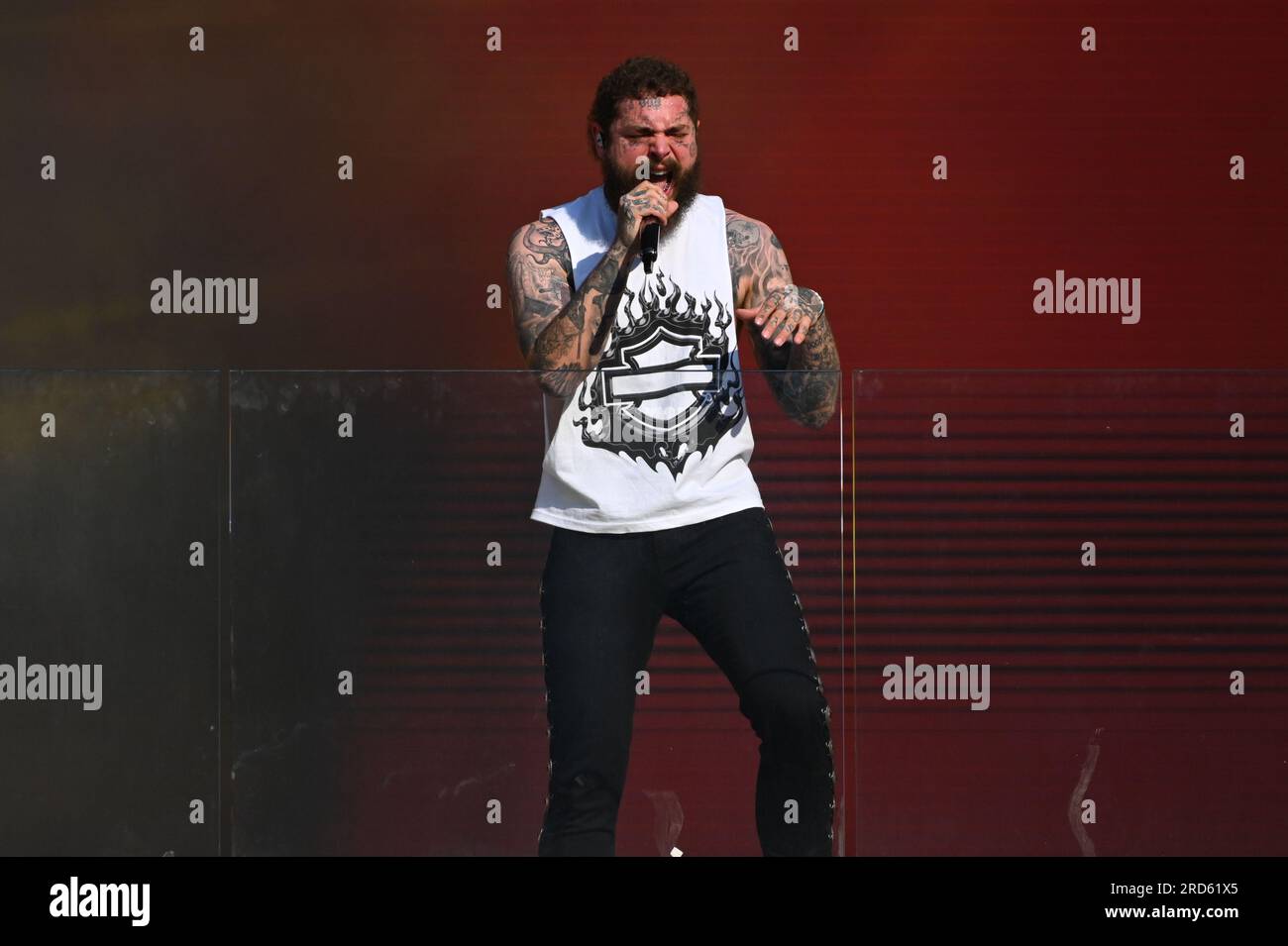 Post Malone performs a free concert on an outdoor stage at TSX Broadway ...