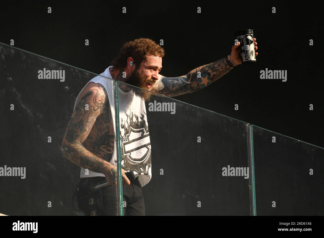Post Malone performs a free concert on an outdoor stage at TSX Broadway ...