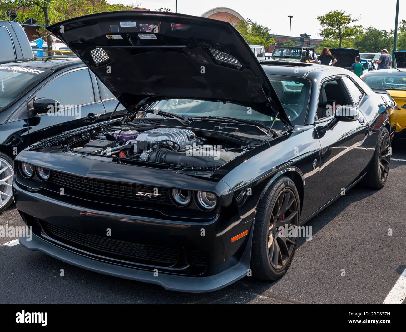 A Dodge Challenger Hellcat on display at a car show in Homestead ...