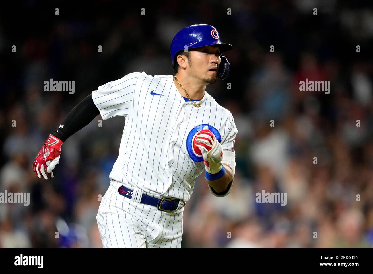 Chicago Cubs' Seiya Suzuki watches his RBI single off Washington ...