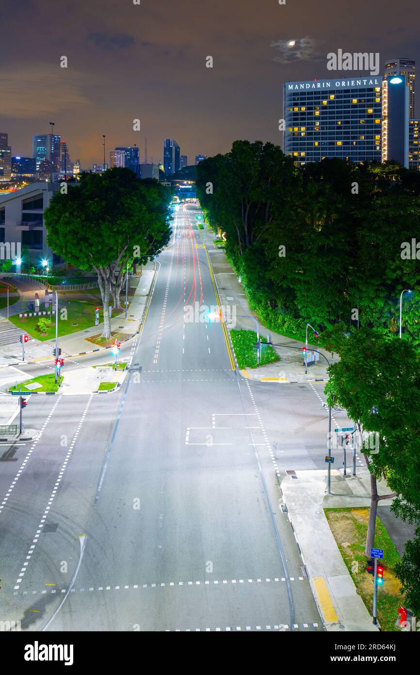 A night view of Raffles Avenue in Singapore at its intersection with ...