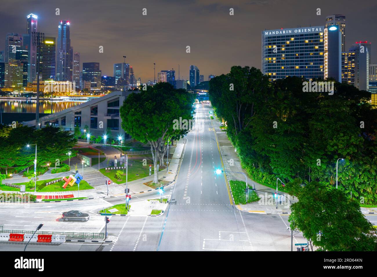 A night view of Raffles Avenue in Singapore at its intersection with ...