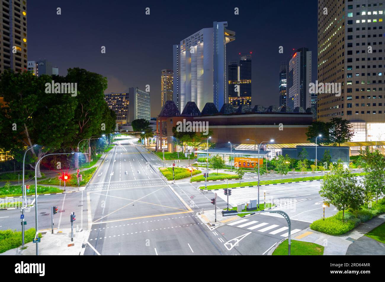 A night view looking along Raffles Boulevard in Singapore at its ...