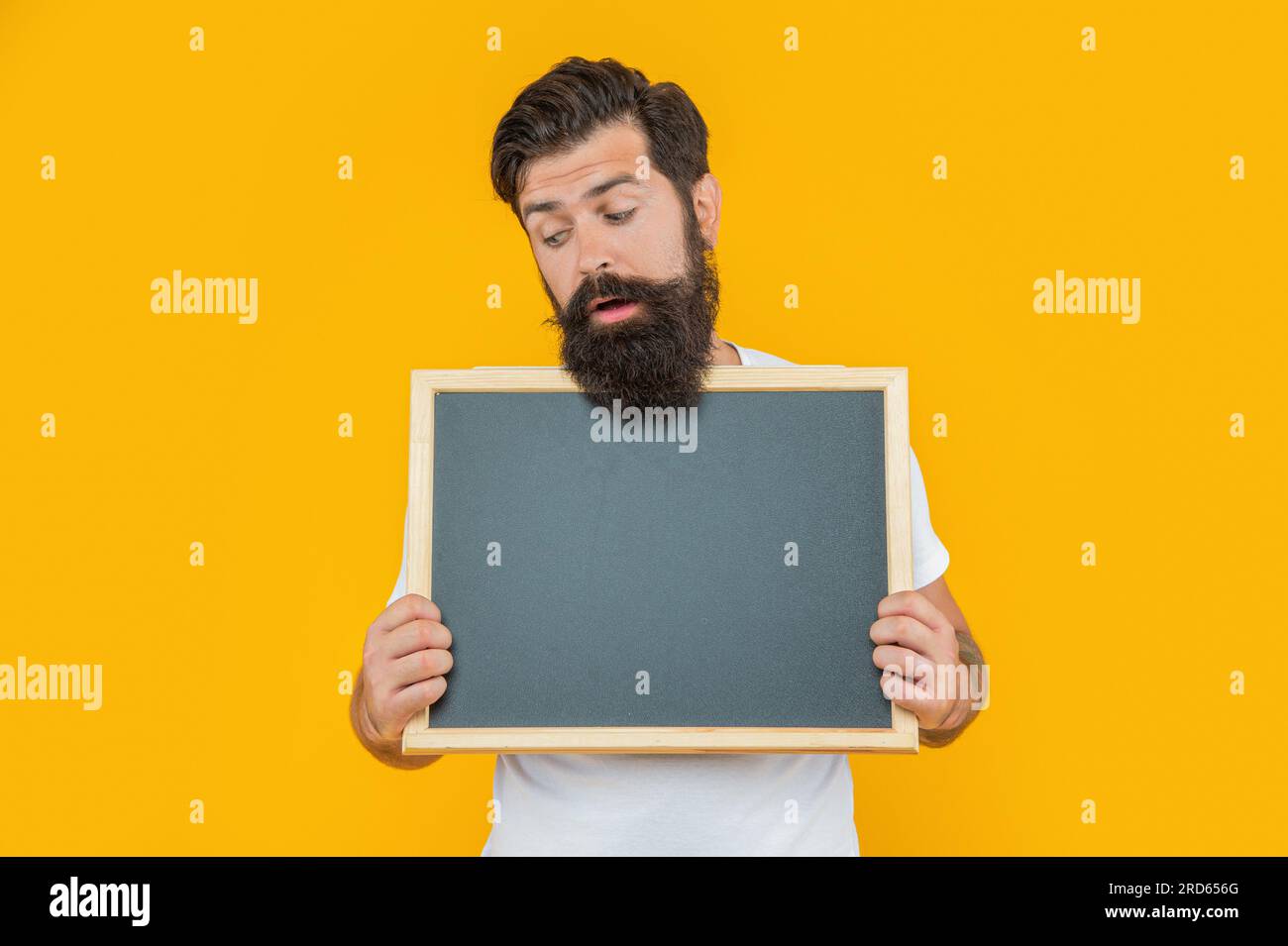 surprised man offer advertisement on background with copy space. man ...