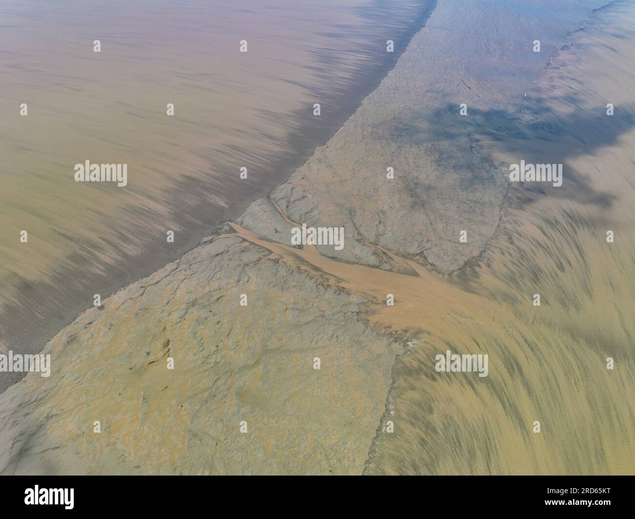 Aerial photo shows rare three-stream tidal bores converging along ...