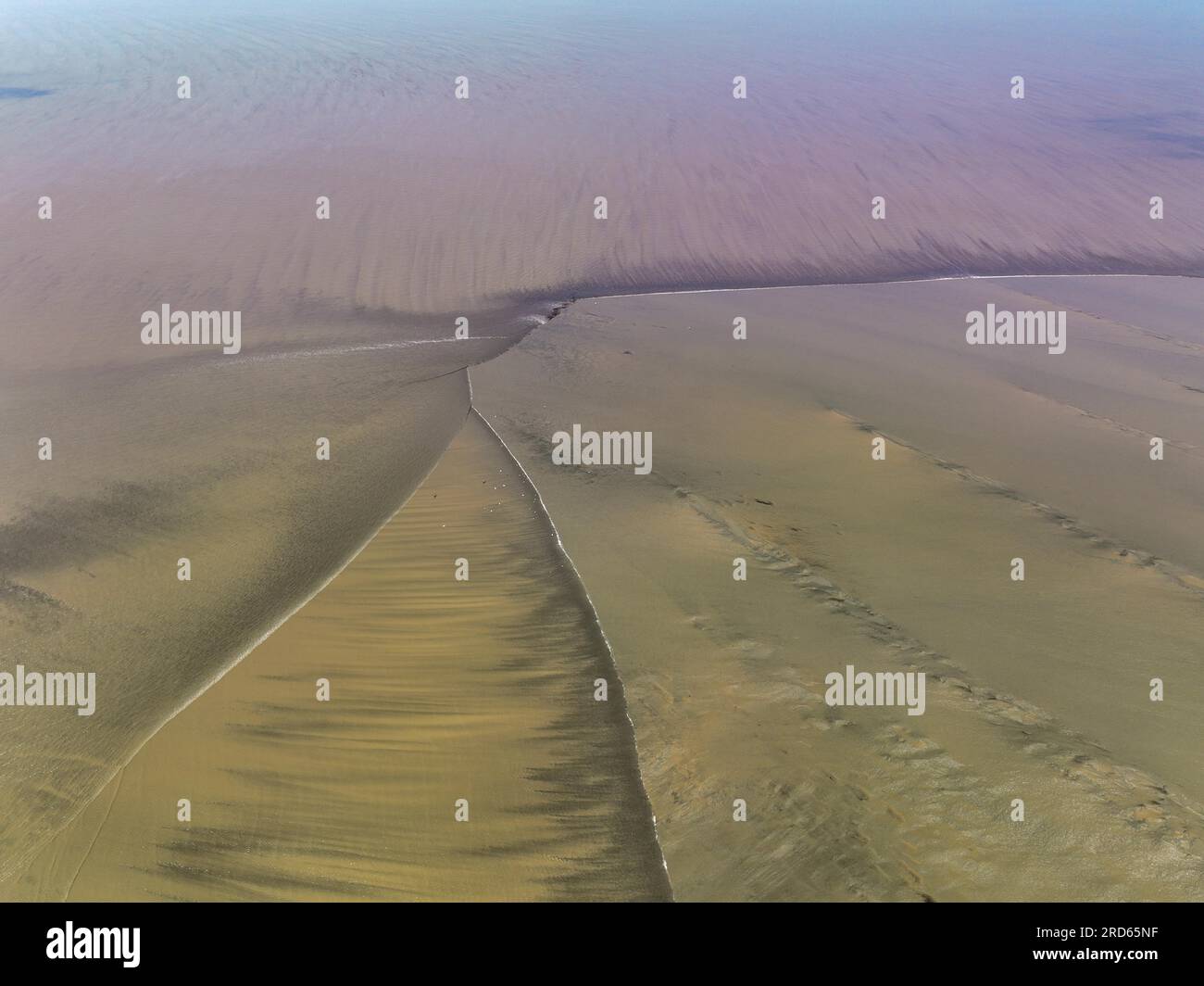 Aerial photo shows rare three-stream tidal bores converging along ...
