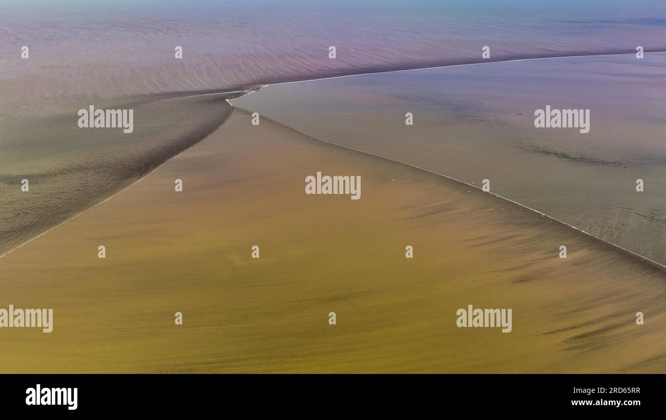 Aerial photo shows rare three-stream tidal bores converging along ...