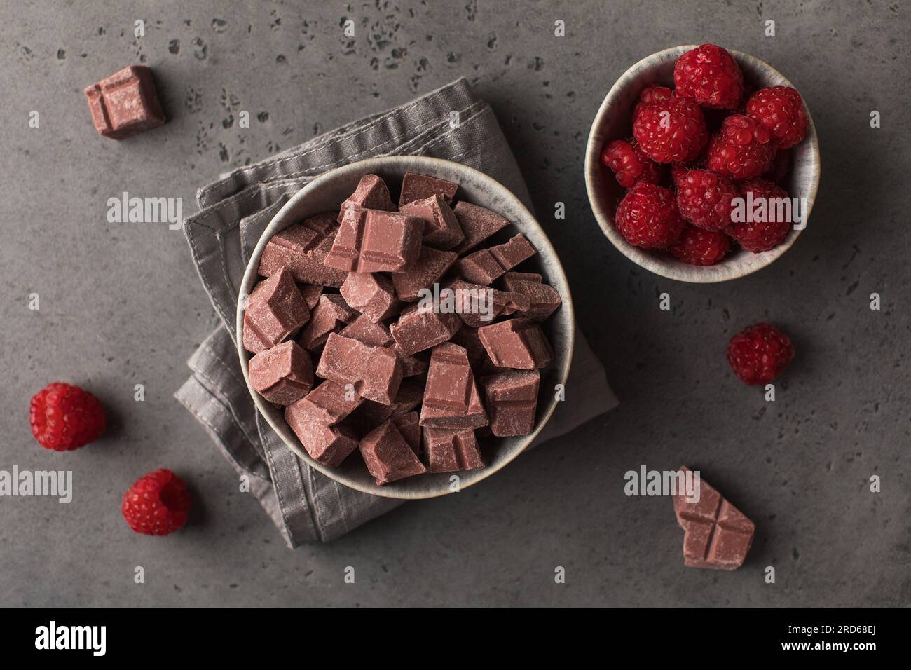 Organic pink chocolate with raspberry flavor. Pieces of artisan ...