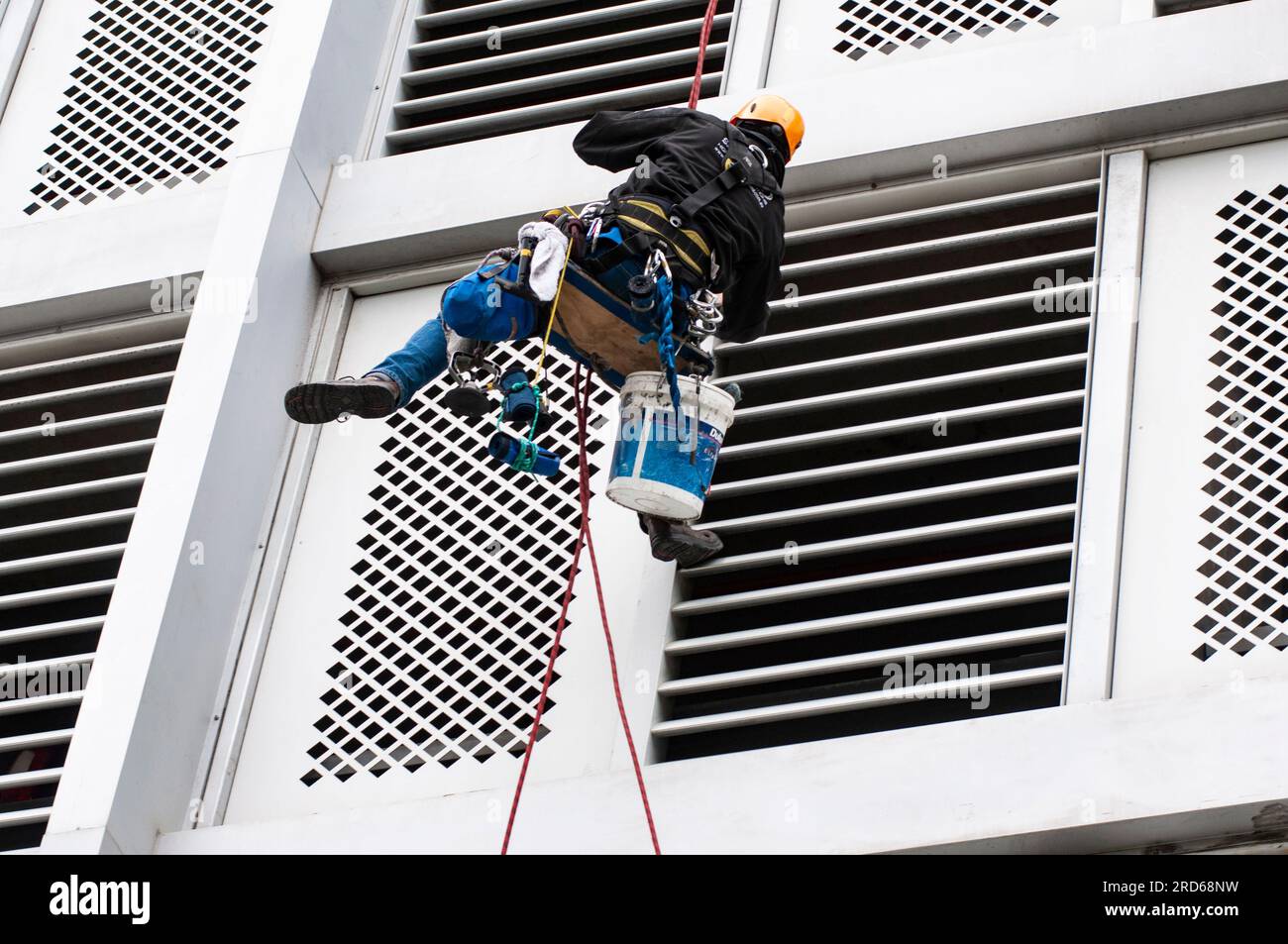 Men working at height cleaning the exterior of a Melbourne apartment ...