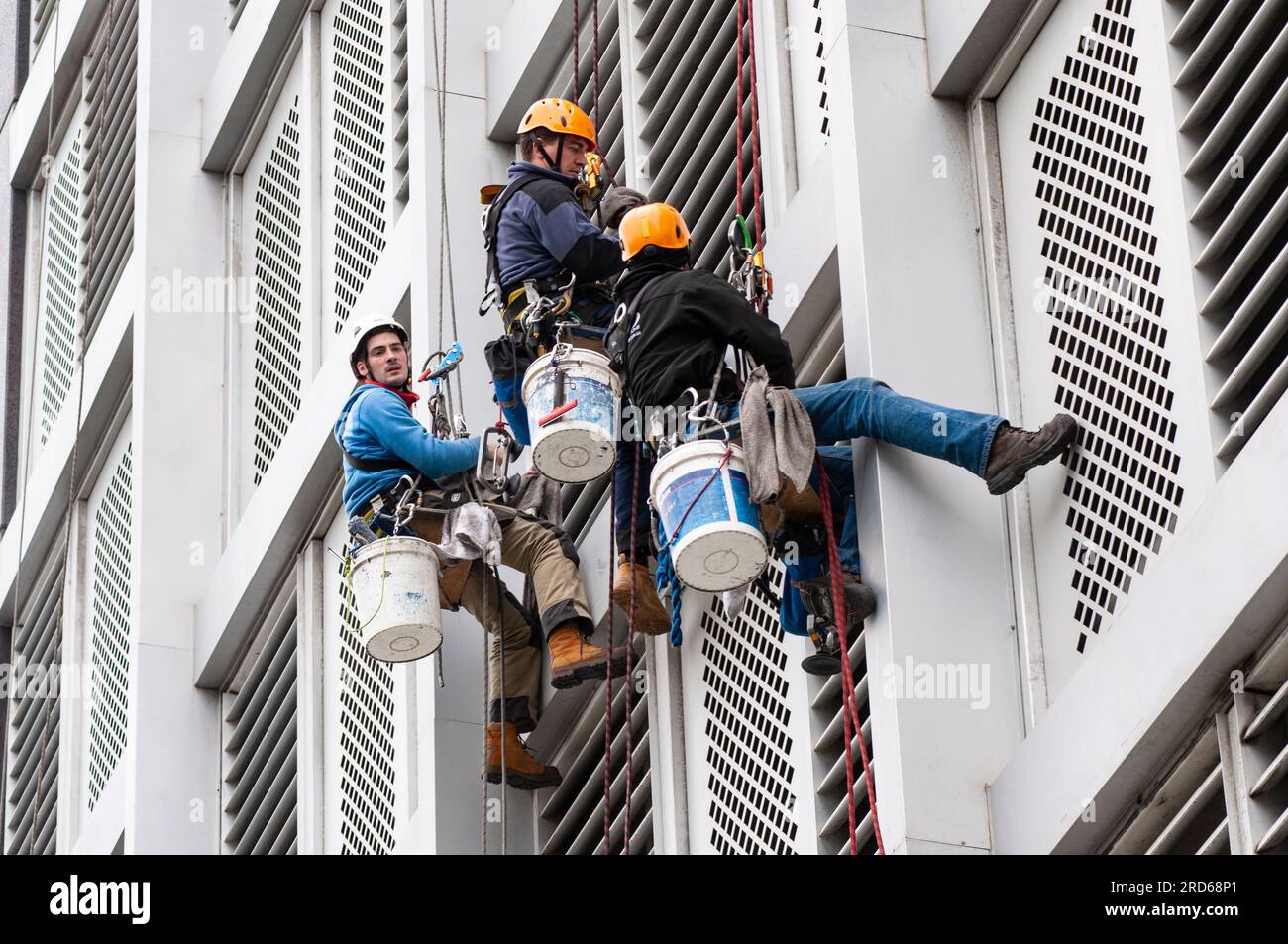 Men working at height cleaning the exterior of a Melbourne apartment ...