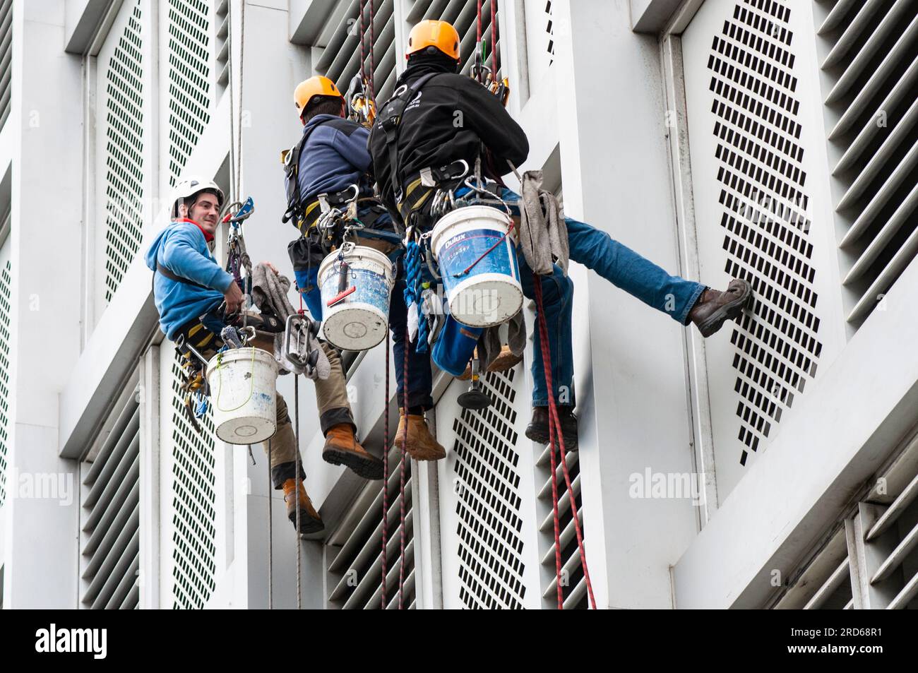 Men working at height cleaning the exterior of a Melbourne apartment ...