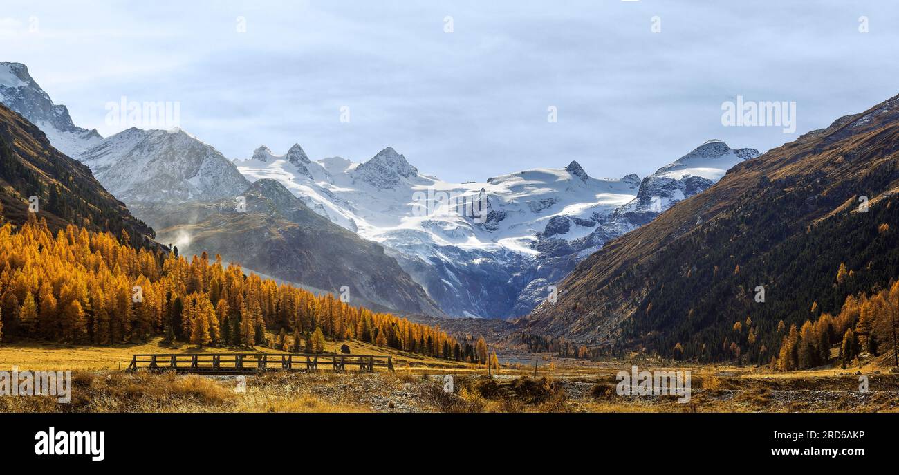 The famouse Roseg Valley with wooden bridge. The Roseg Glacier is at ...
