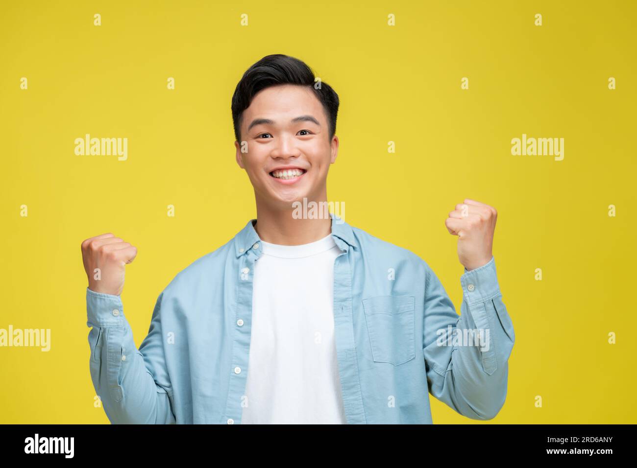 Excited man celebrating joyful hi-res stock photography and images - Alamy