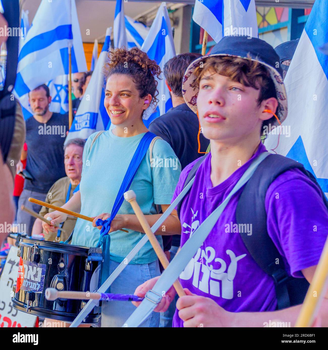 Haifa, Israel - July 18, 2023: People protest with flags and various ...