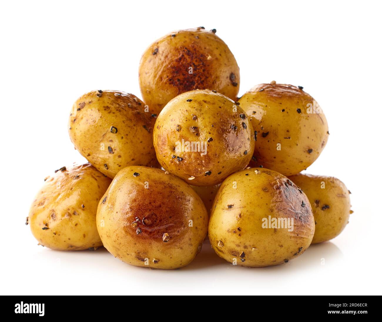 boiled and roasted potatoes pile isolated on white background Stock ...
