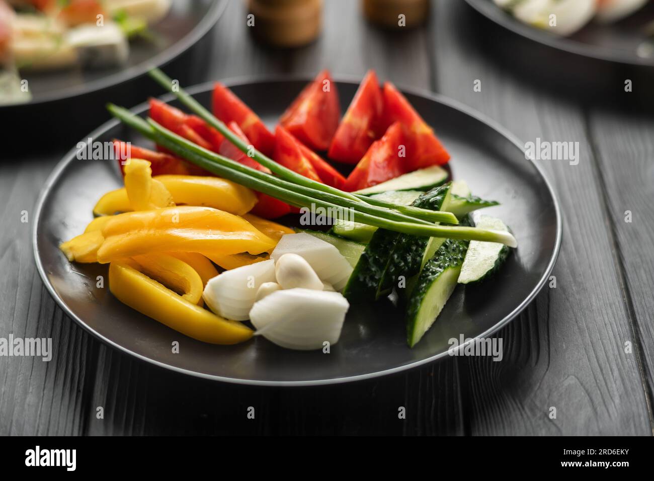 Party table setting with various veggie snacks and vegetarian starters ...