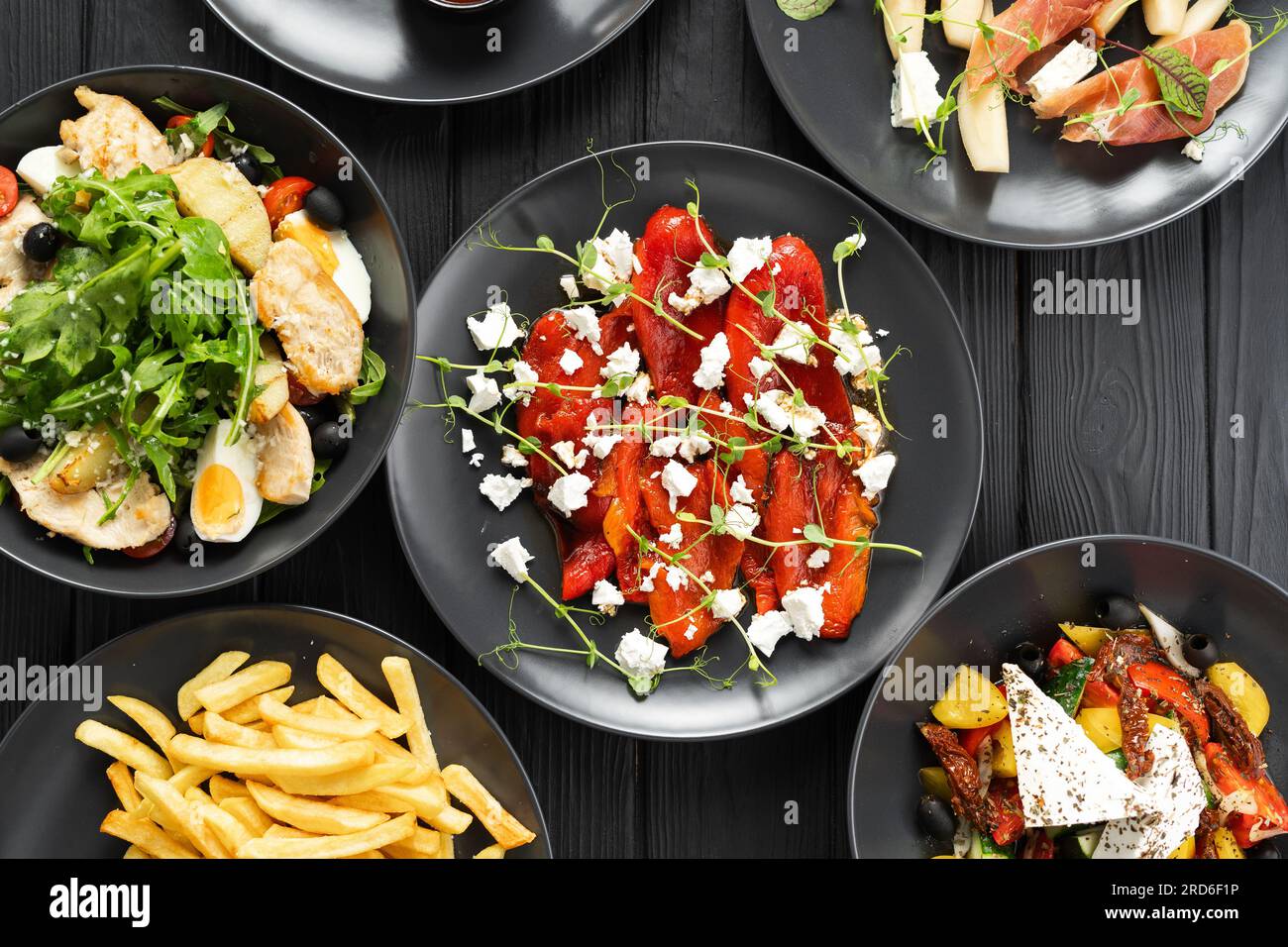 Assortment of fresh vegetable salads flat lay. Top view on buffet with ...