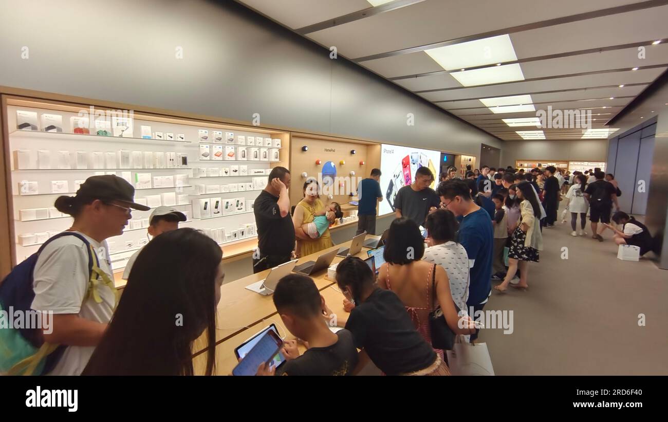 SHANGHAI, CHINA - JULY 18, 2023 - Visitors shop at the Apple Flagship ...