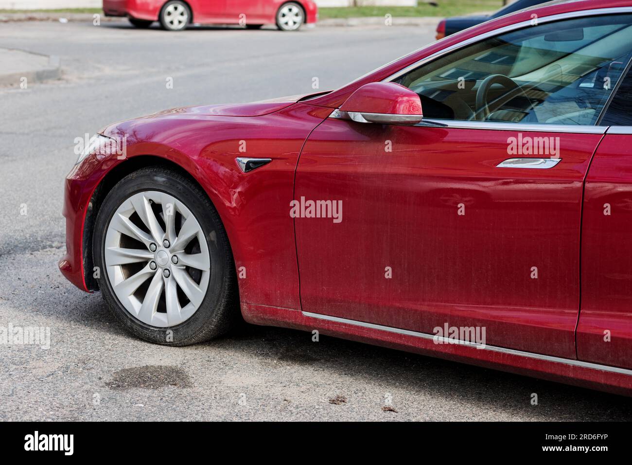 Minsk, Belarus, July 2023 - metallic red Tesla Model S - side view ...