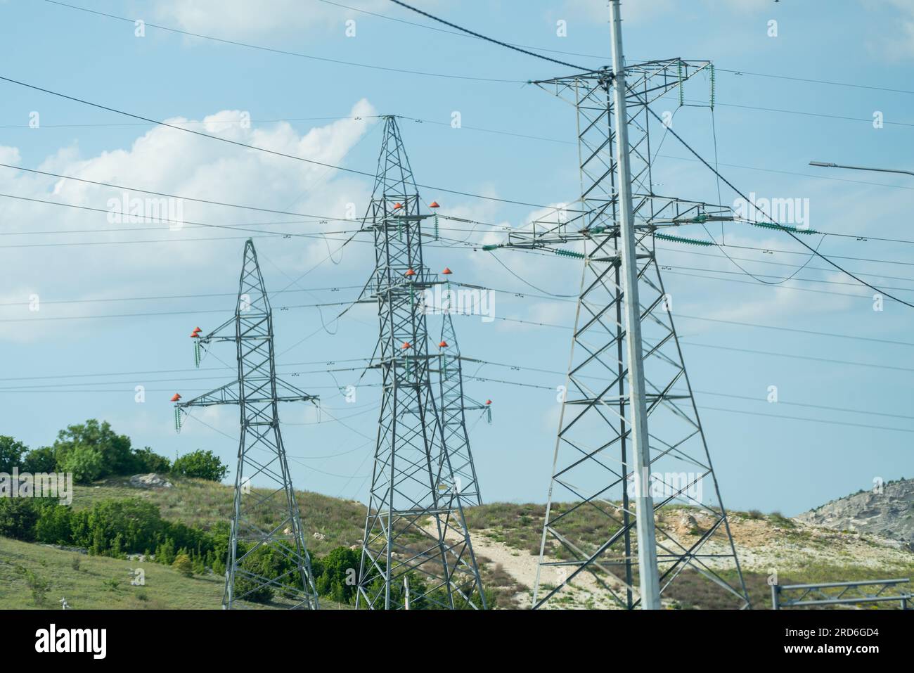 High voltage towers with sky background. Power line support with wires ...