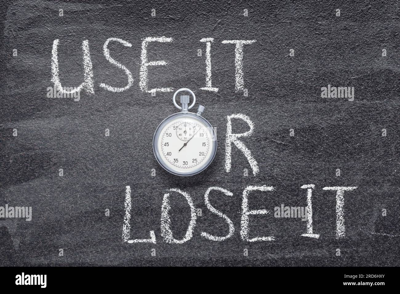 use it or lose it phrase written on chalkboard with vintage precise ...