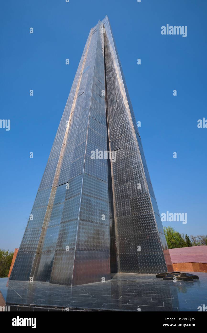 The large, abstract, silver, metal stele monument, dedicated to the ...