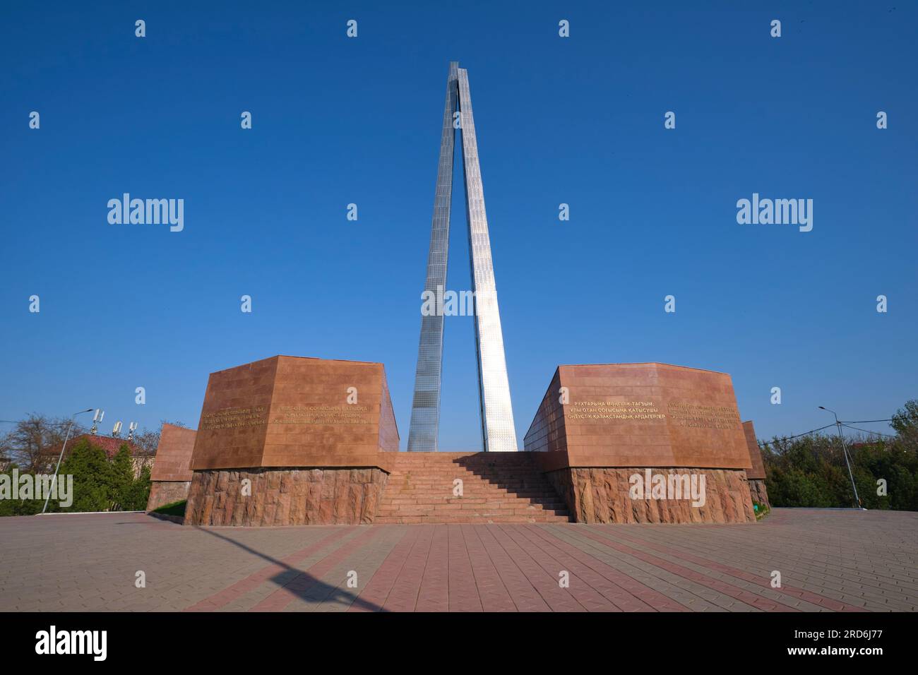 The large, abstract, silver, metal stele monument, dedicated to the ...