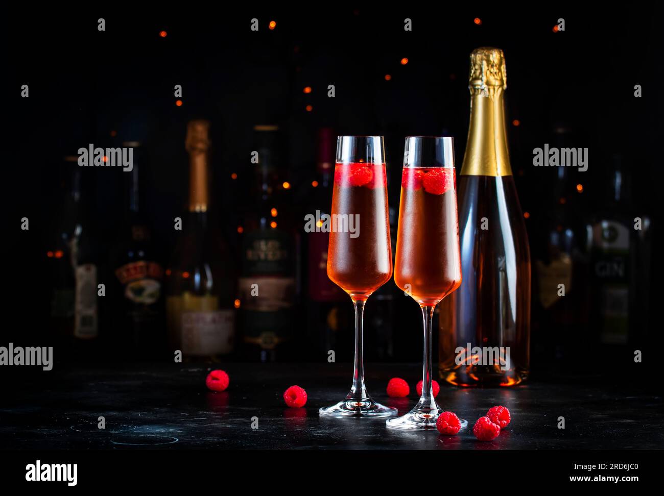 Raspberry Rossini alcoholic cocktail drink with prosecco, cava, or sparkling wine with raspberry ...