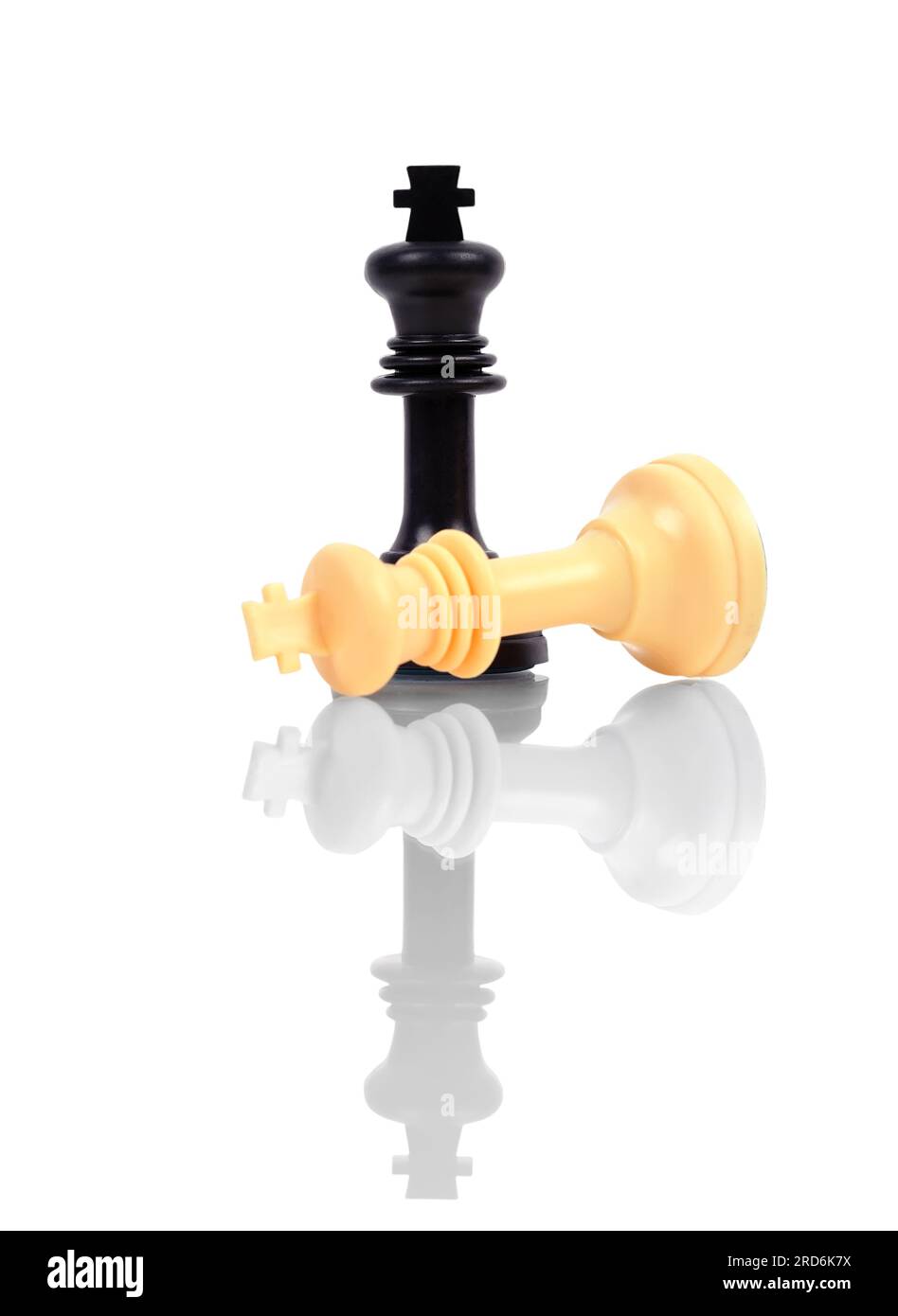 Black chess king defeated white chess king Stock Photo - Alamy