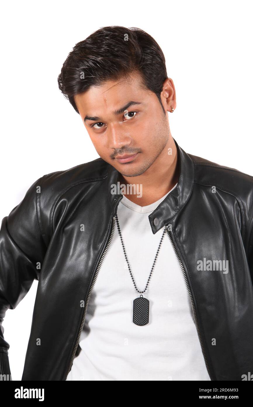 A young Indian handsome guy questioning, on white studio background ...