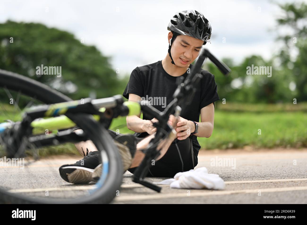 Bicycle accident. Young cyclist having an accident, falling down from ...
