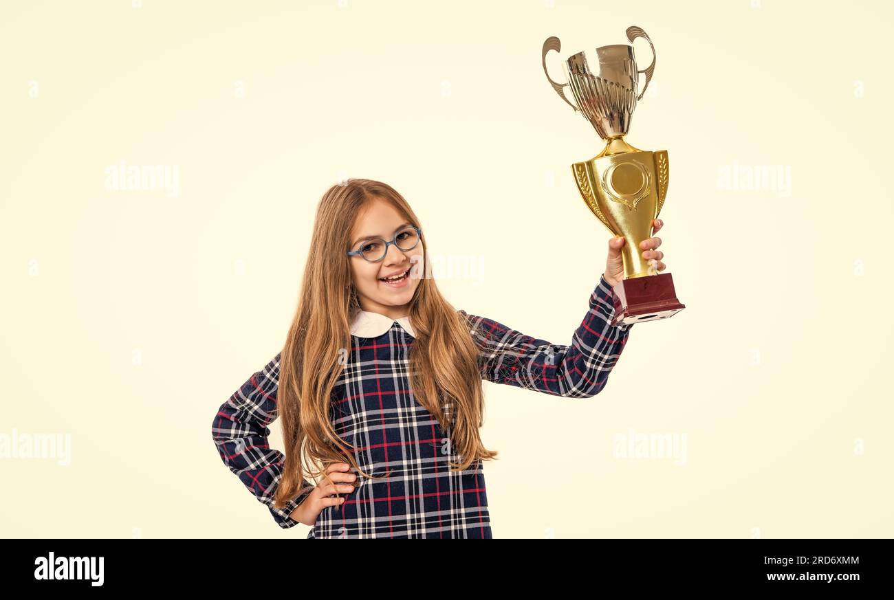 cheerful excellent school girl with award isolated on white background ...